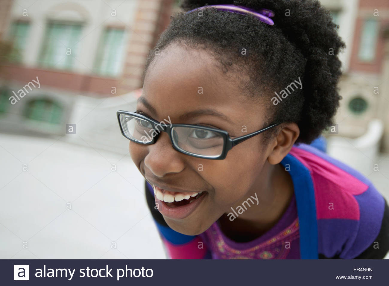 Female, African American elementary student making faces Stock Photo ...