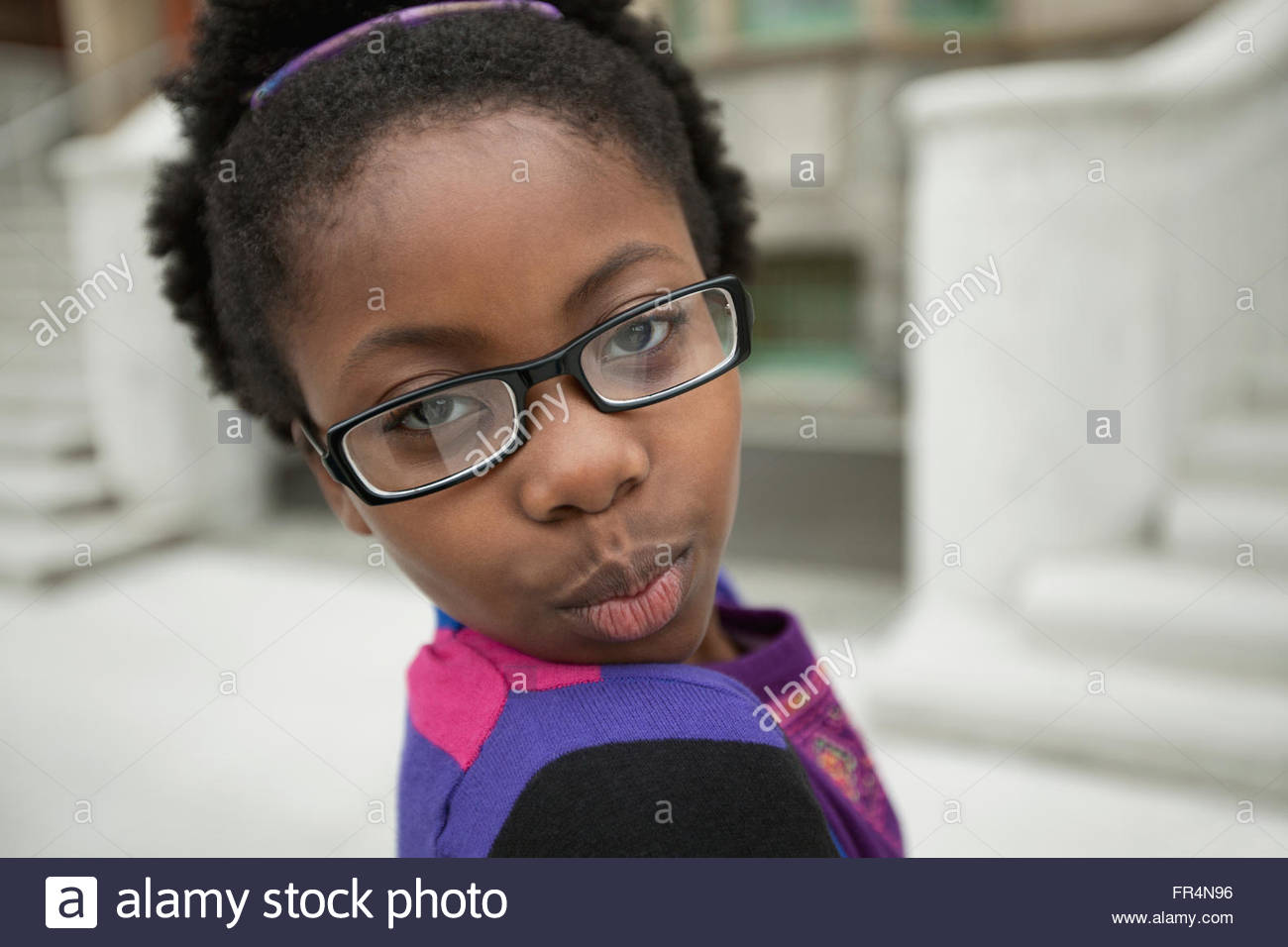 Female, African American elementary student making faces Stock Photo ...