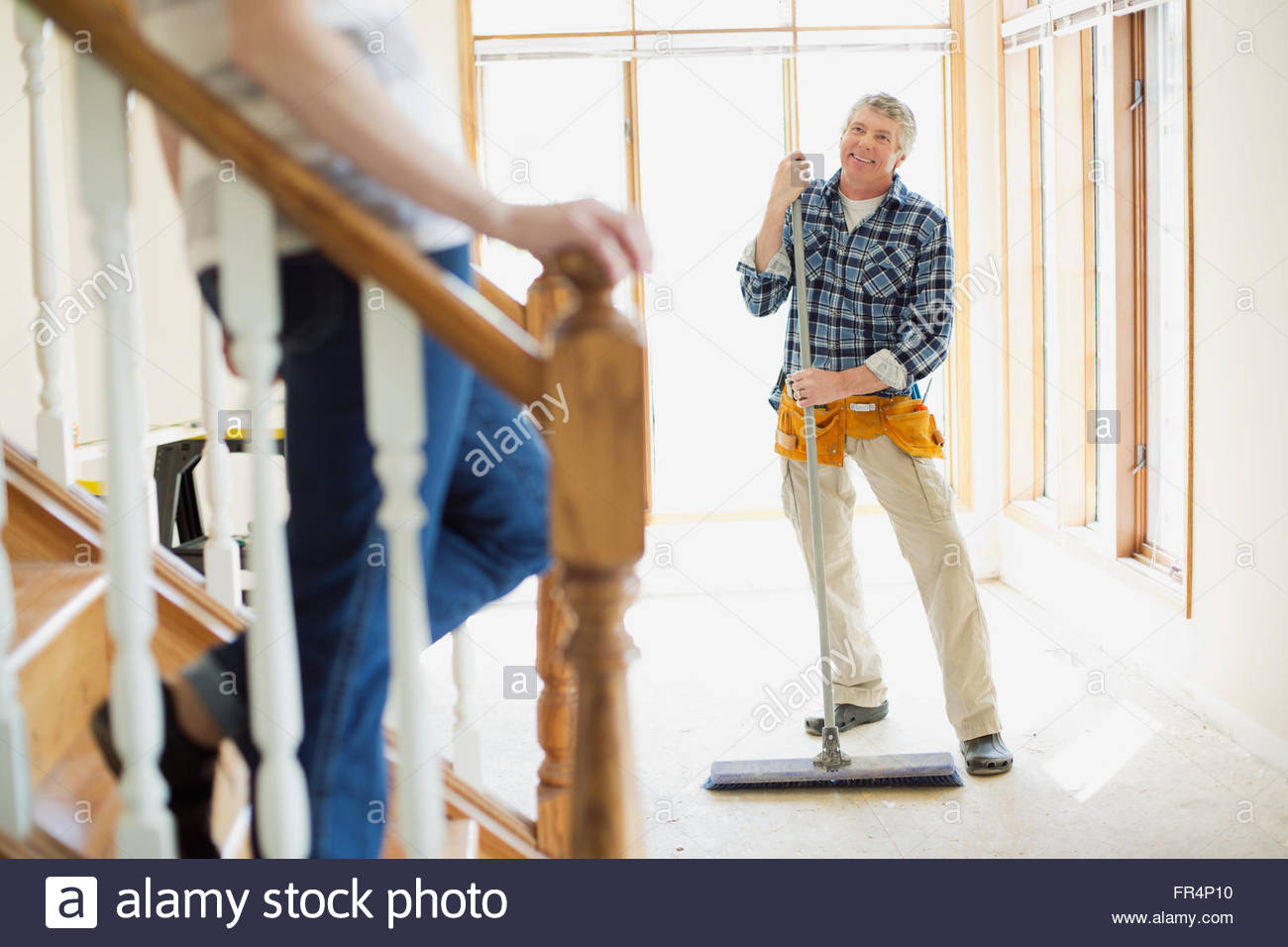 Husband sweeping hi-res stock photography and images - Alamy