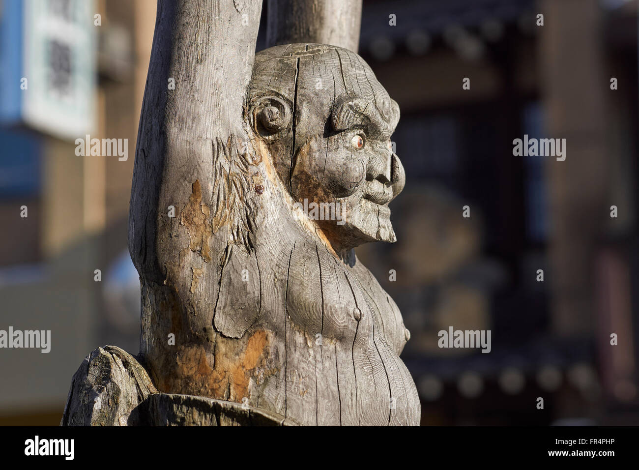Long-armed wooden sculpture - street art in central Takayama, depicting ...