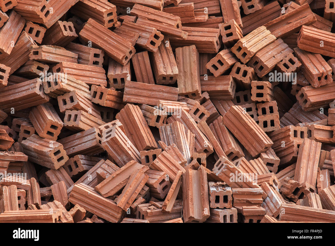 Brick stack in construction site, Texture Background Stock Photo - Alamy