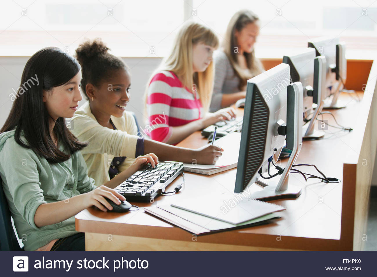 Middle school student in computer lab hi-res stock photography and ...