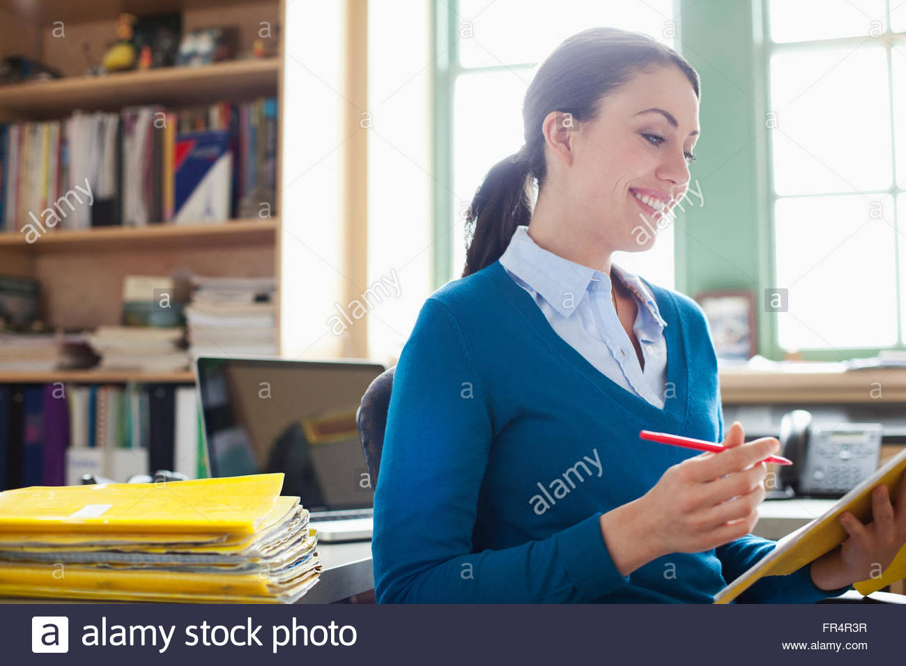 Marking school papers hi-res stock photography and images - Alamy