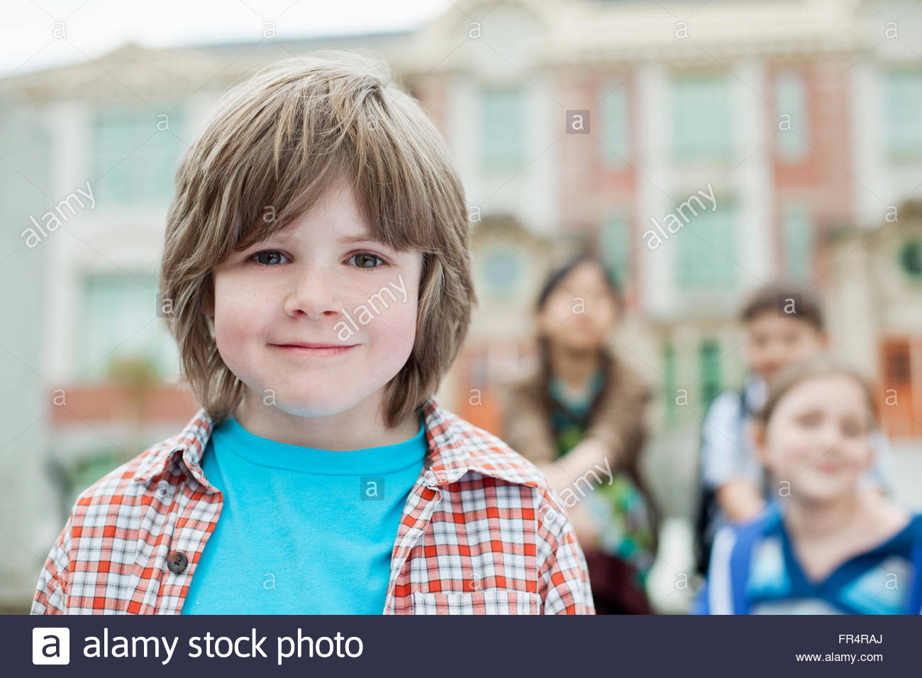 portrait of elementary student with classmates Stock Photo - Alamy