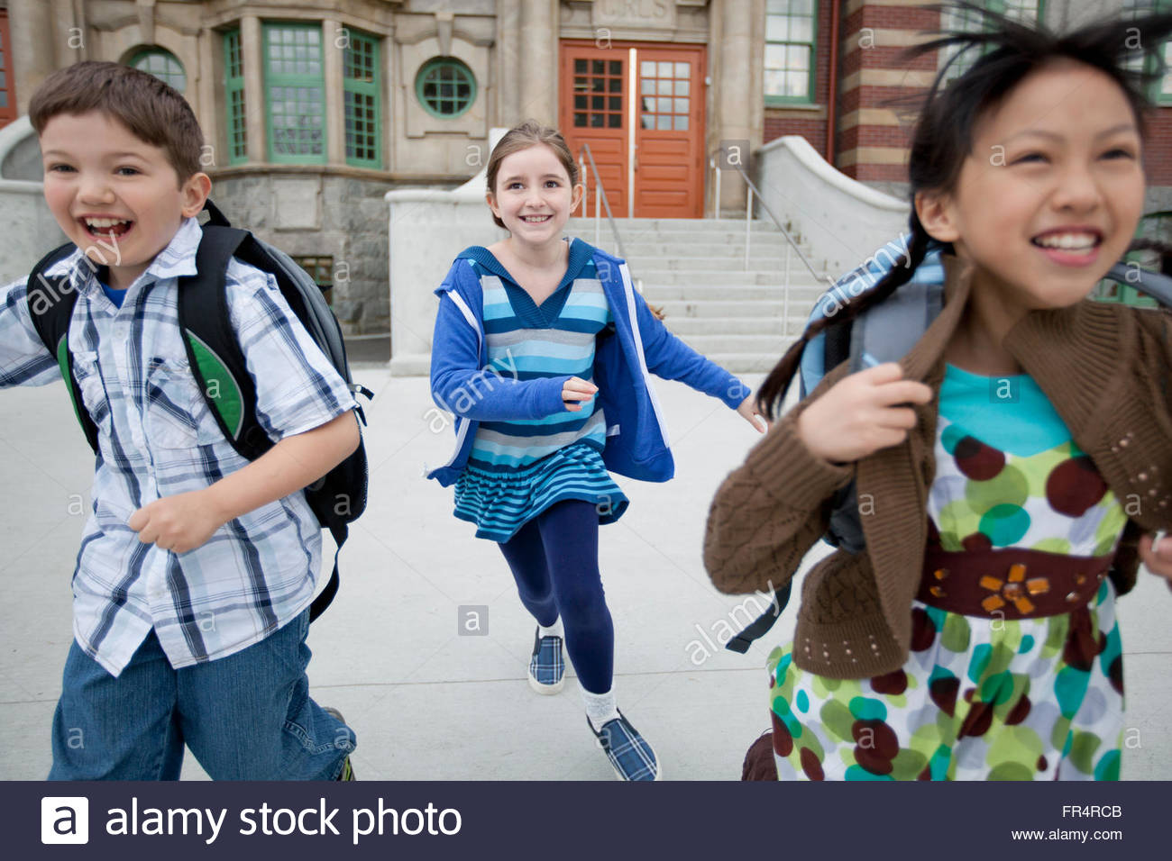 Running to school hi-res stock photography and images - Alamy