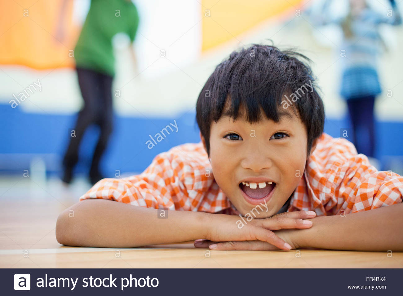 elementary students playing in gymnasium Stock Photo - Alamy