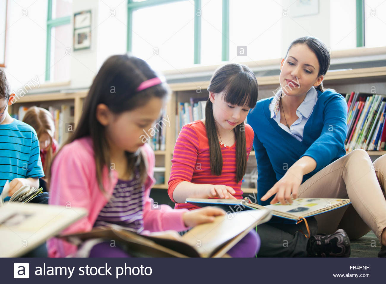 Female teacher 20s full length hi-res stock photography and images - Alamy