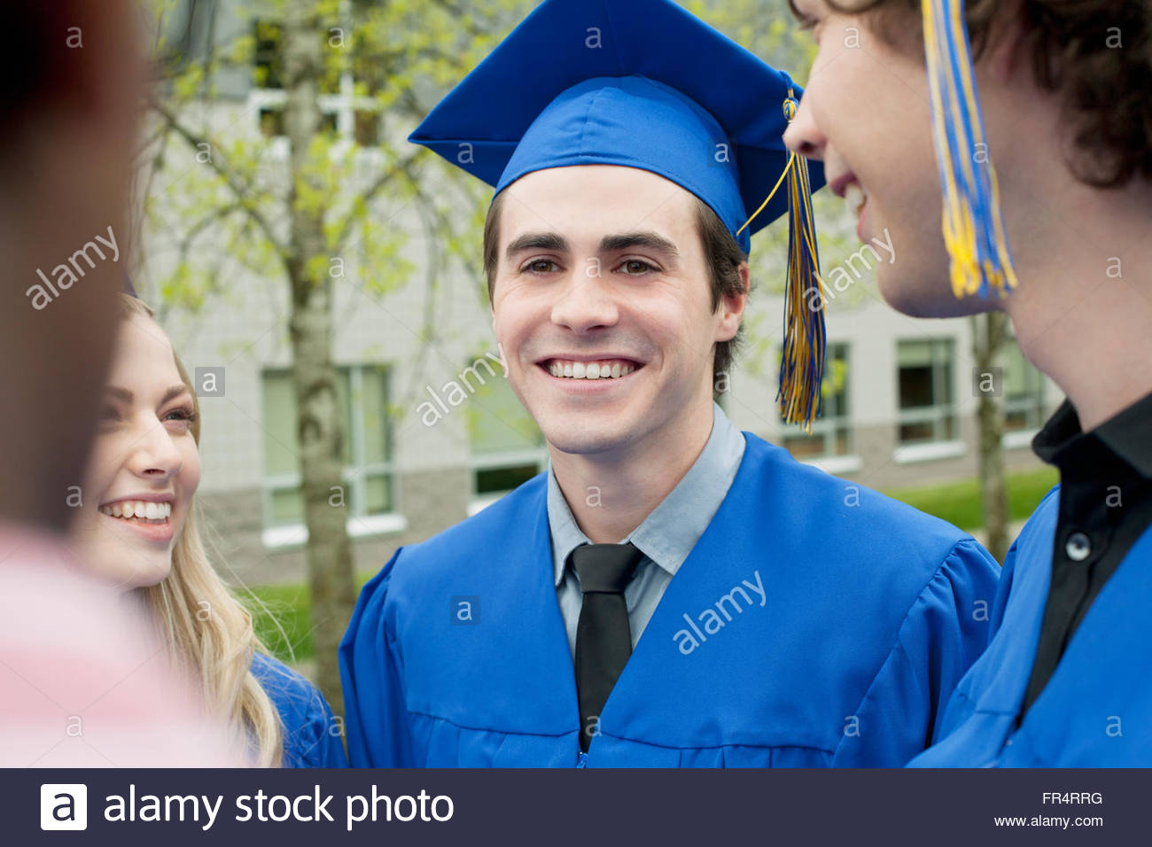 Happy graduates blue hi-res stock photography and images - Alamy