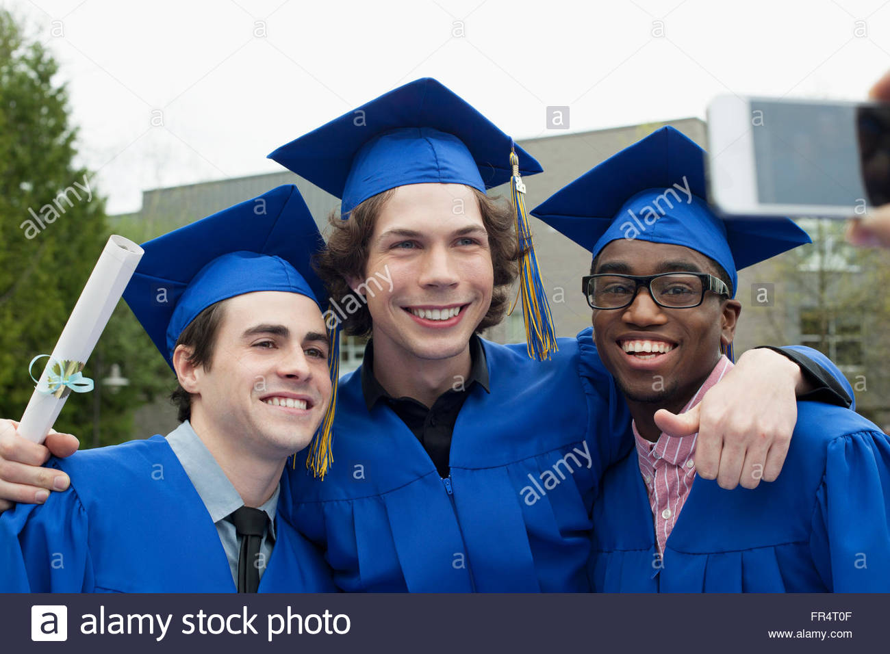 graduates taking pictures of each other Stock Photo - Alamy