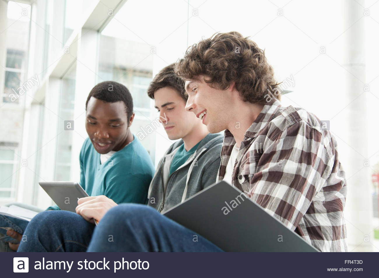 college men using computer technology Stock Photo - Alamy