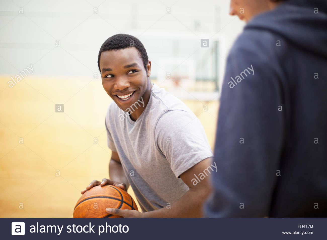 male college student practicing basketball Stock Photo - Alamy
