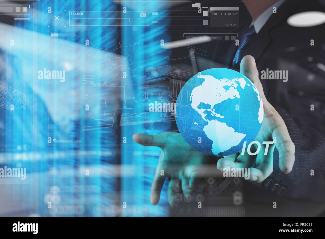 double exposure of hand showing Internet of things (IoT) word diagram ...