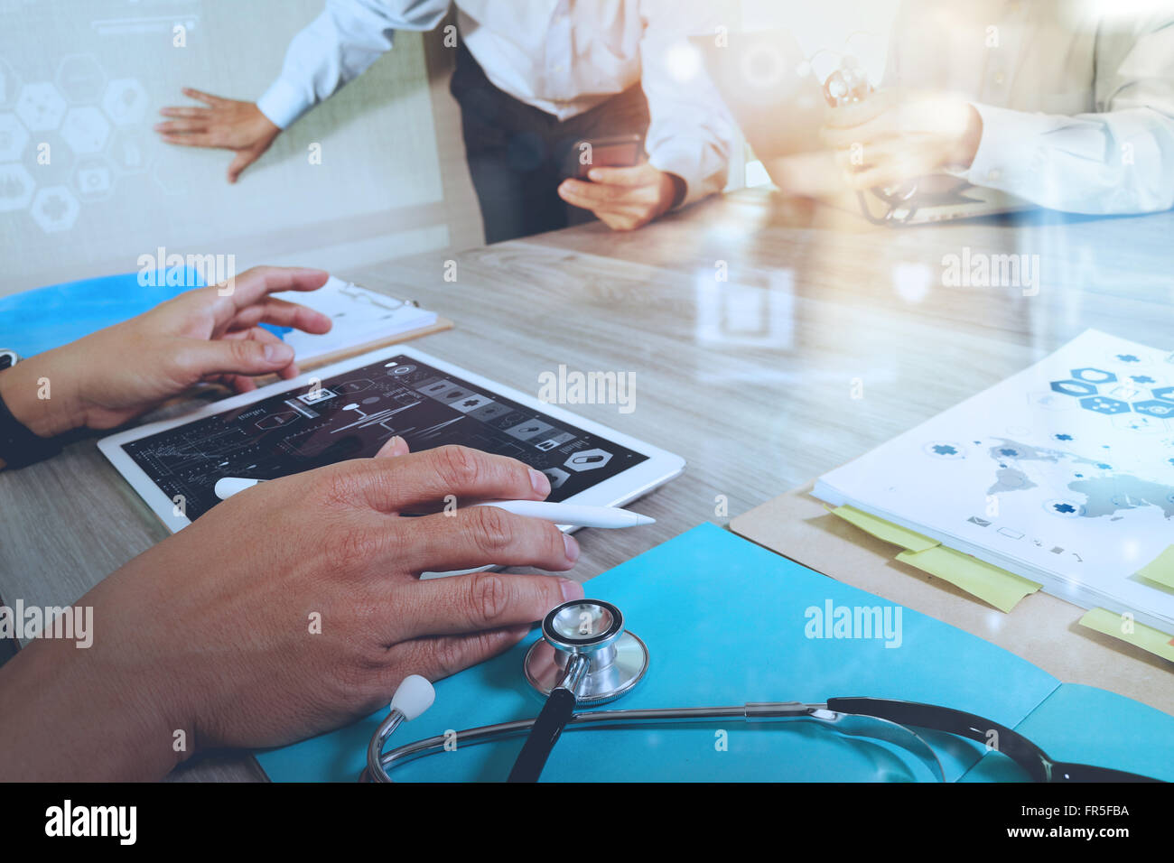 Medicine doctor hand working with modern computer and digital pro ...