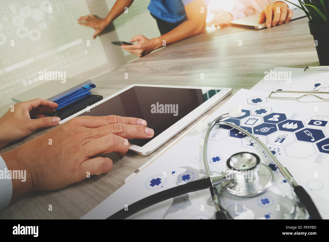 Medicine doctor hand working with modern computer and digital pro ...