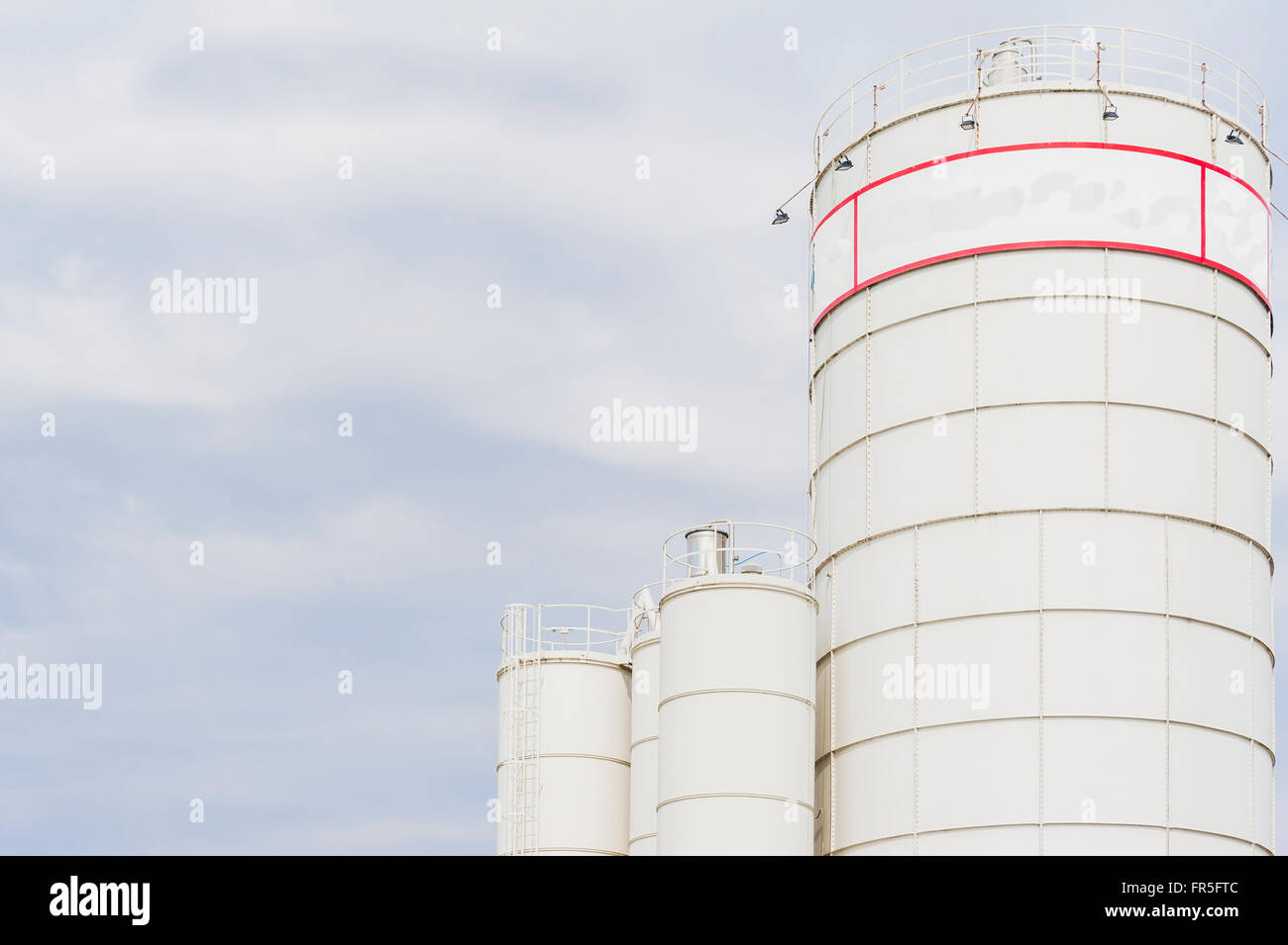 White silos for the production of concrete Stock Photo - Alamy