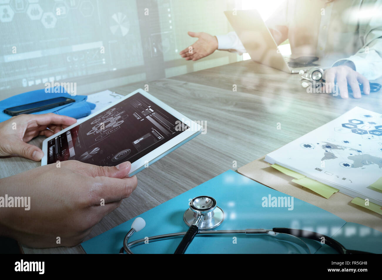 Medicine doctor hand working with modern computer and digital pro ...