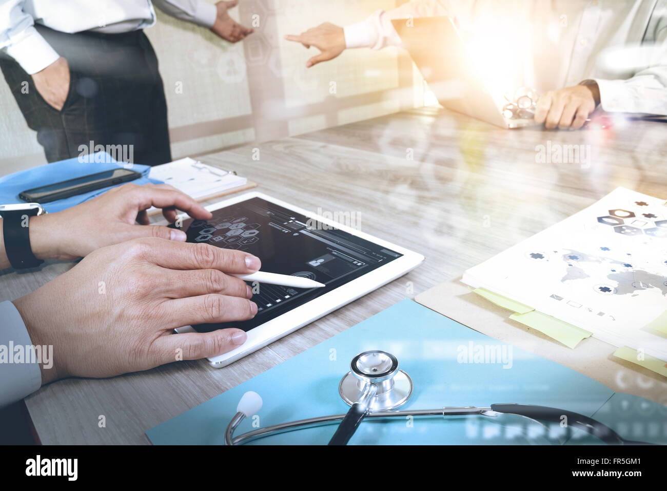 Medicine doctor hand working with modern computer and digital pro ...