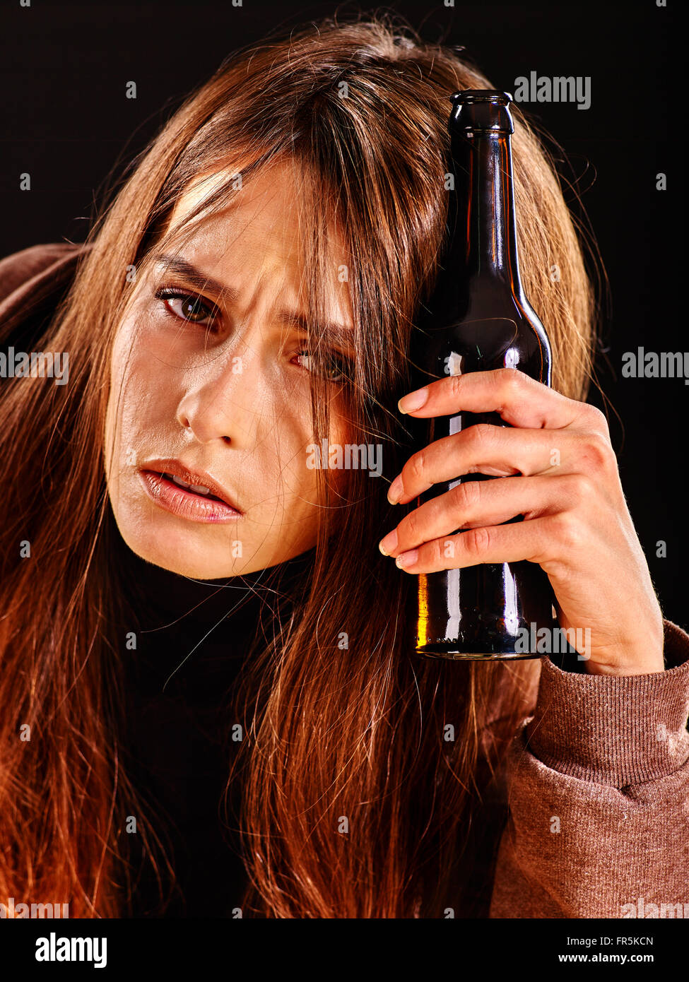 Drunk girl holding bottle vodka hi-res stock photography and images - Alamy