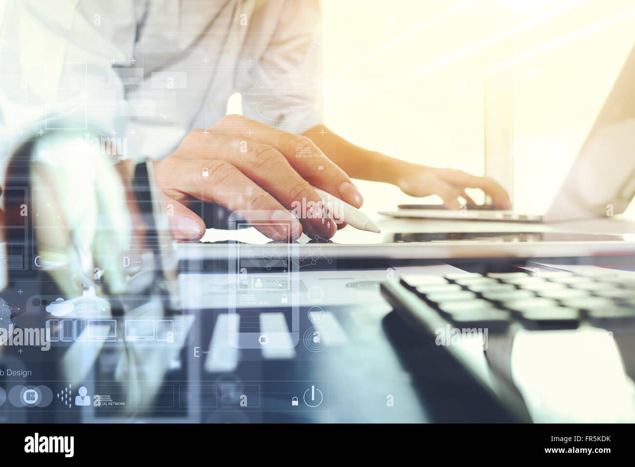 business documents on office table with laptop computer and graph ...