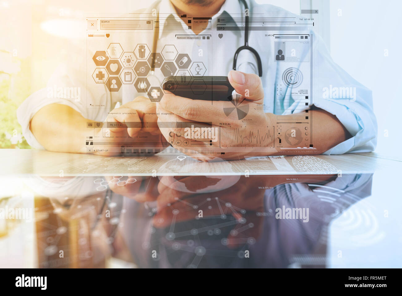 Medicine doctor hand working with modern smart phone with computer ...