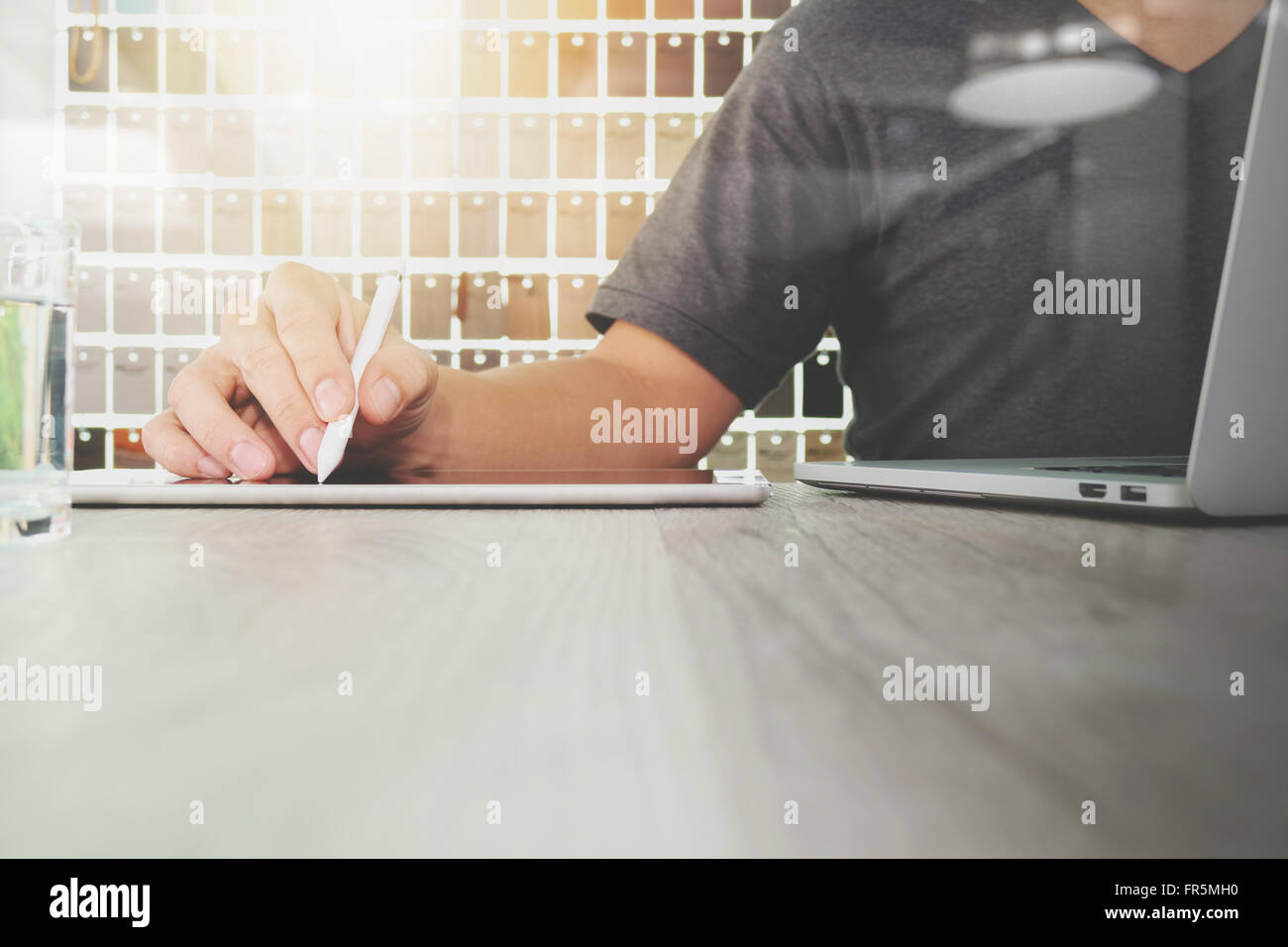 interior designer hand working with digital tablet and laptop computer ...