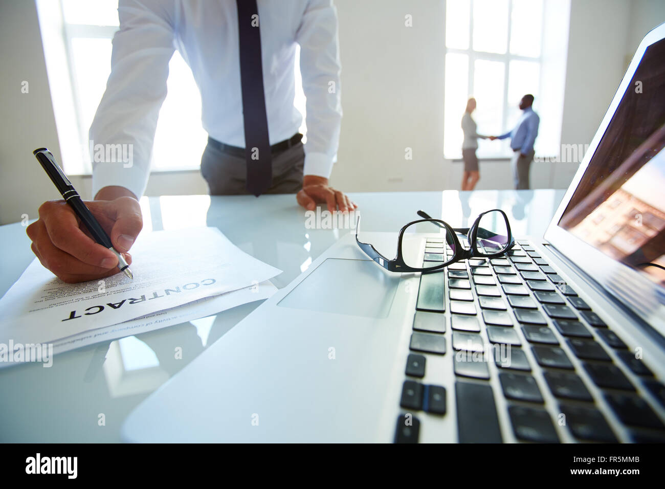 Signing papers close up hi-res stock photography and images - Alamy