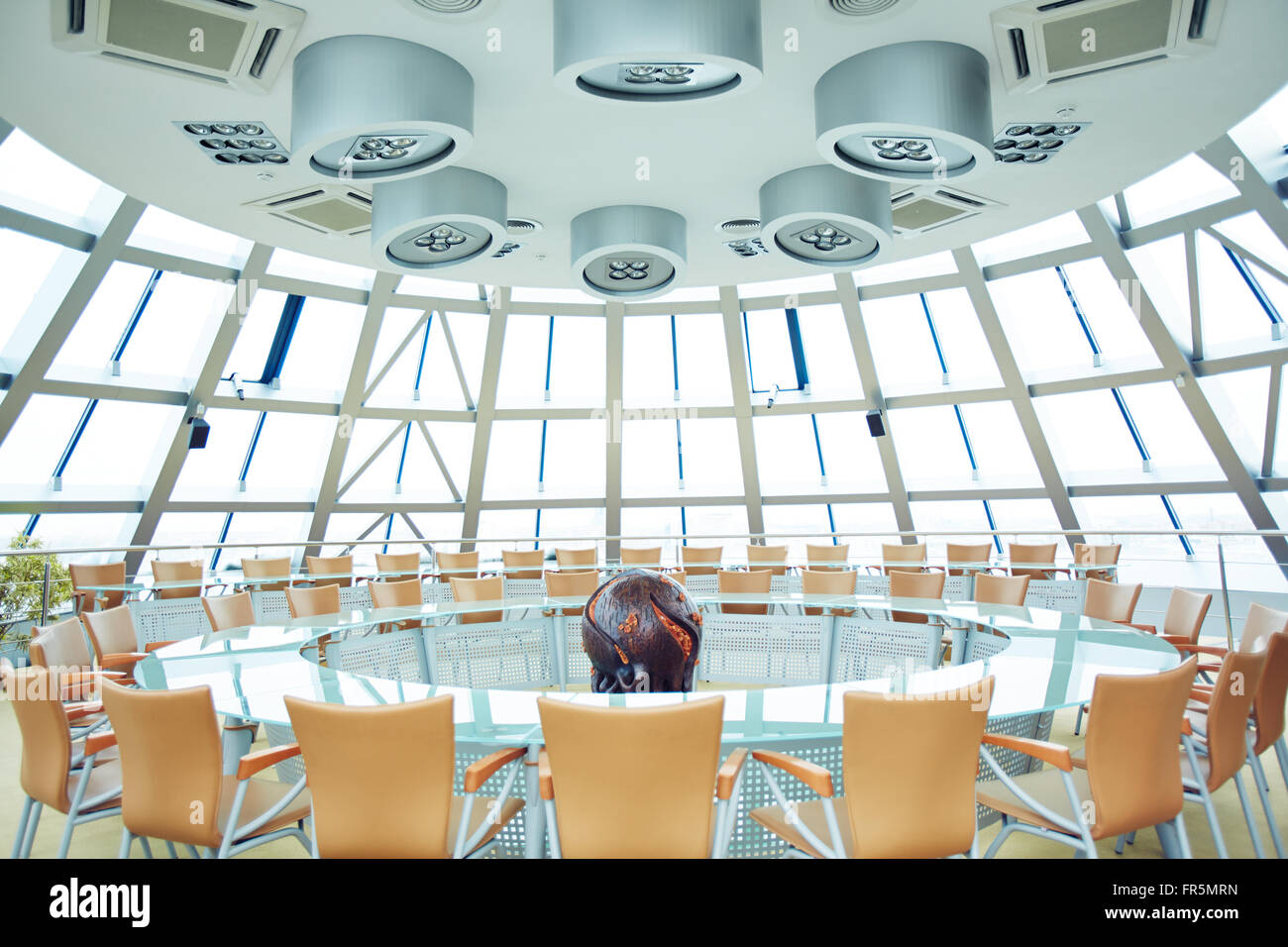 Conference room with round table Stock Photo - Alamy