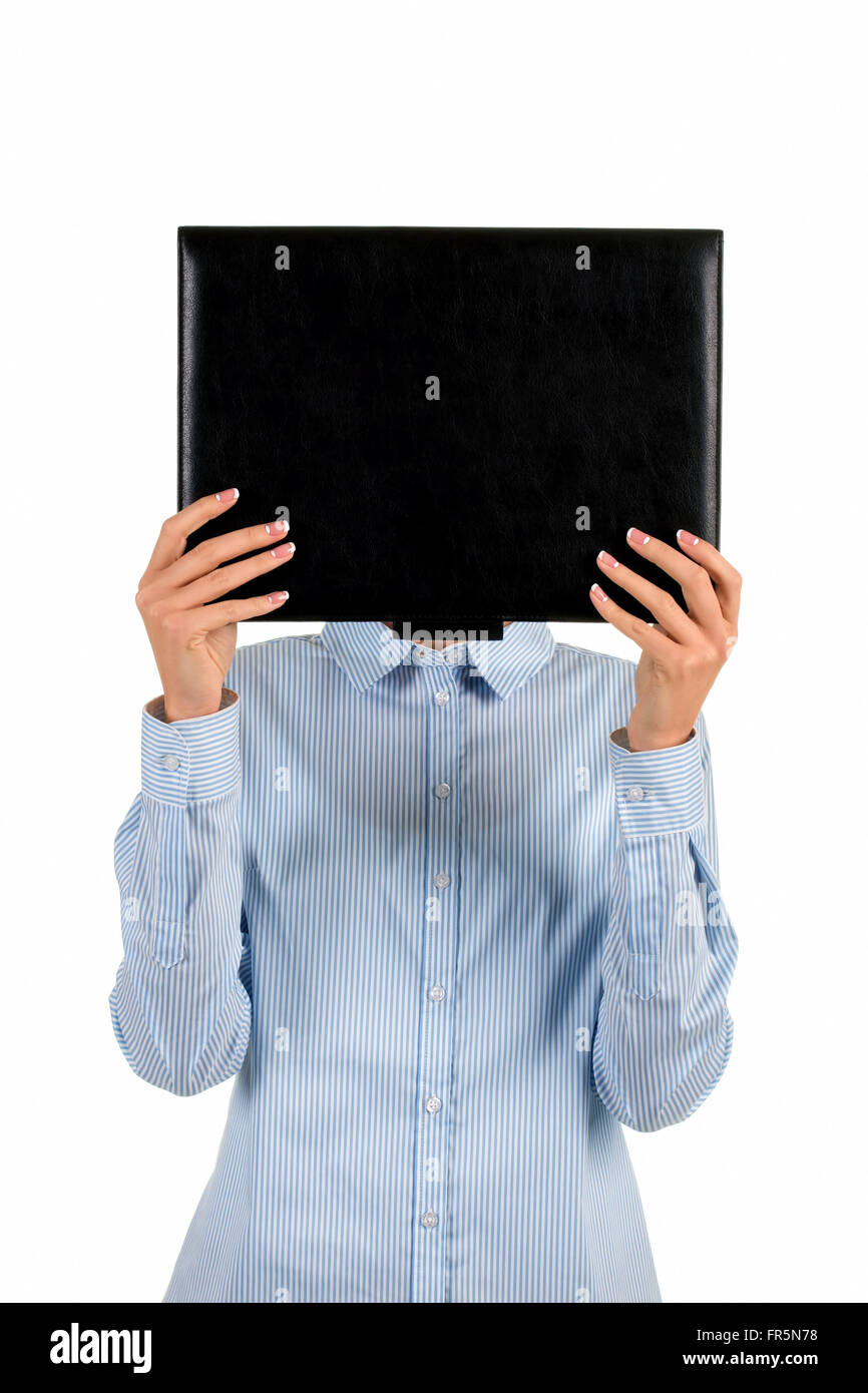 Businesswoman's face covered with folder Stock Photo - Alamy