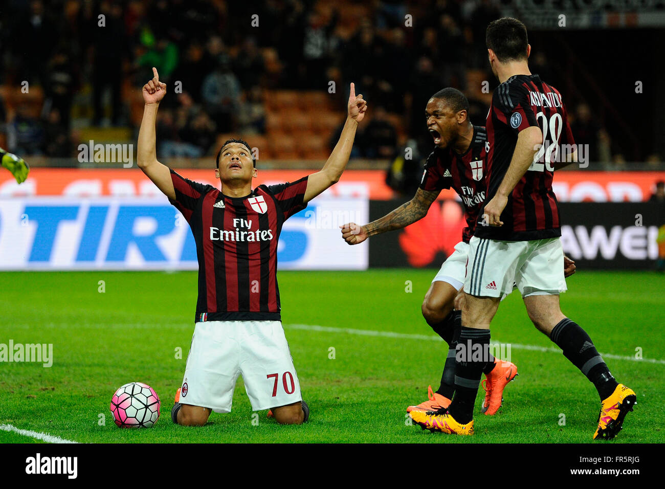 Carlos Bacca of Milan celebrates scoring draw 1-1 with Luiz Adriano and ...