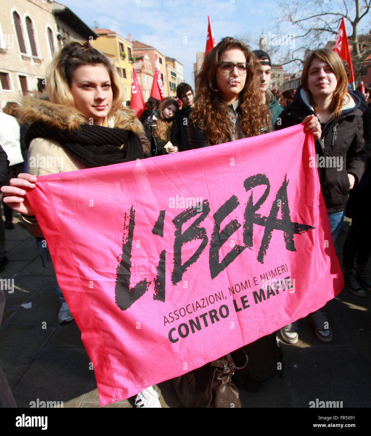 Venice, Italy. 21st Mar, 2016. Girls with a flag of Libera, Italy's ...