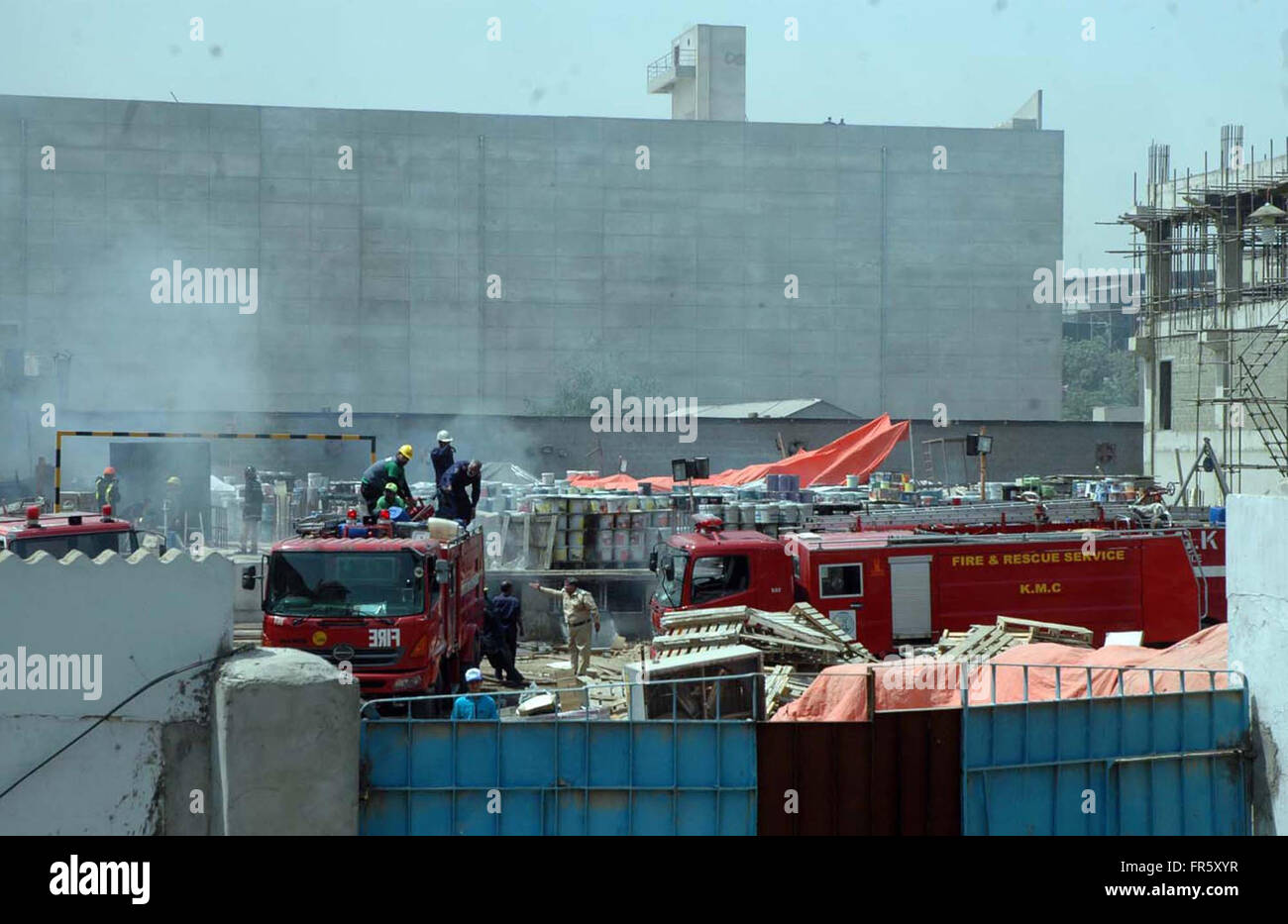 Rescuers are busy in operation at venue after fire broke at paint ...