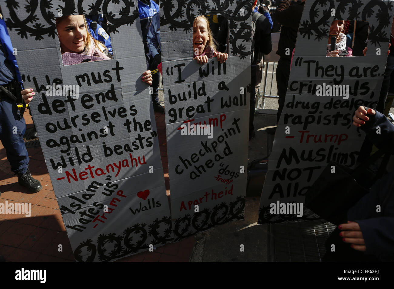 Washington, D.C, USA. 21st Mar, 2016. Demonstrators protest outside of ...