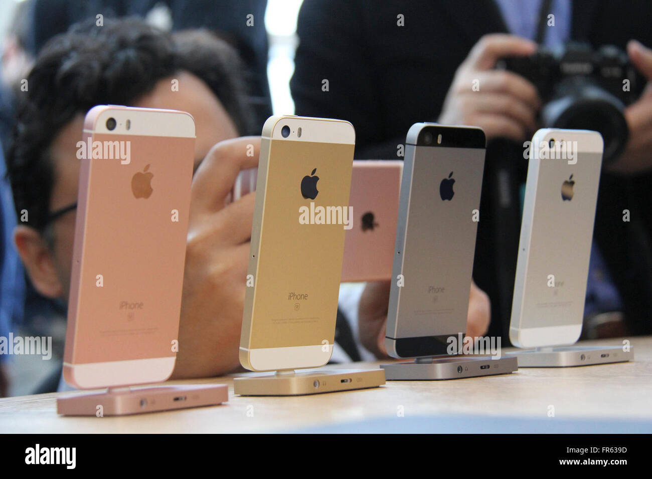 Cupertino. 21st Mar, 2016. Visitors take photos of the new iPhones ...