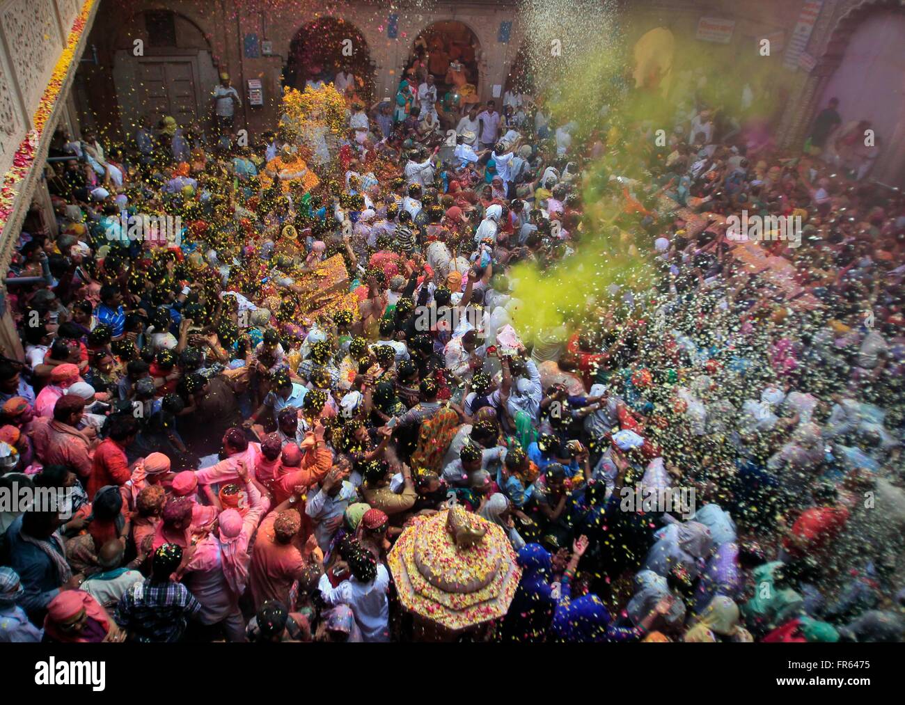 Mathura, India. 19th Mar, 2016. Devotees enjoy dancing and throwing of ...