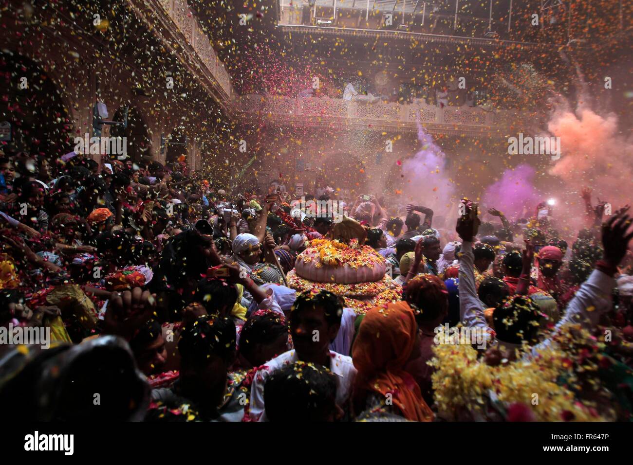 Mathura, India. 19th Mar, 2016. Devotees enjoy dancing and throwing of ...