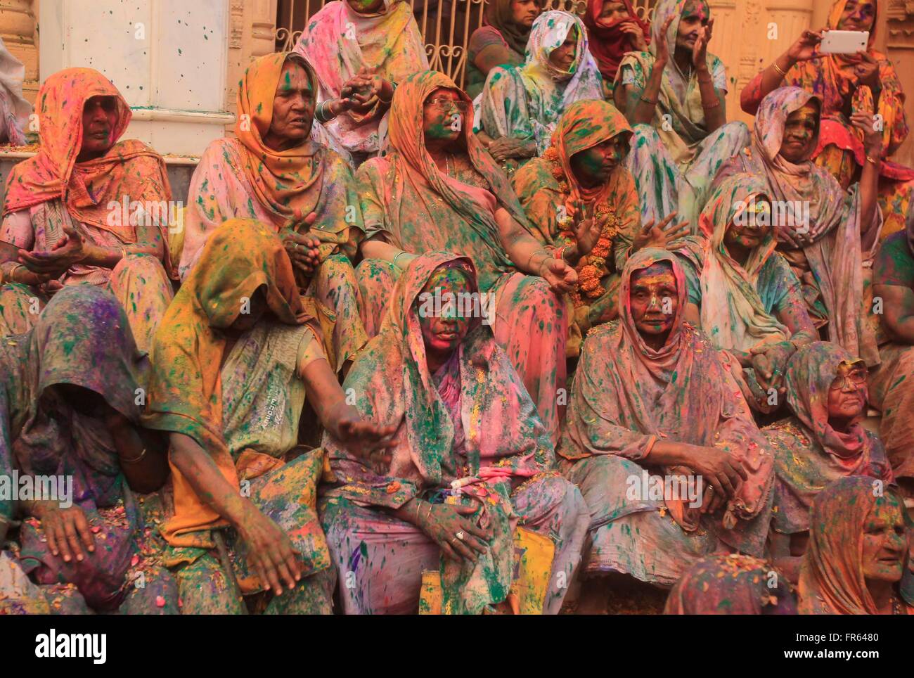 Mathura, India. 21st Mar, 2016. Widows of Mathura bathed with colored ...