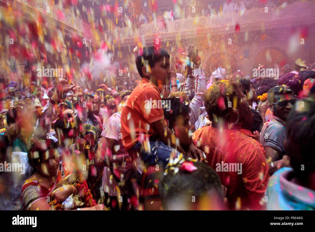Mathura, India. 19th Mar, 2016. Devotees enjoy dancing and throwing of ...