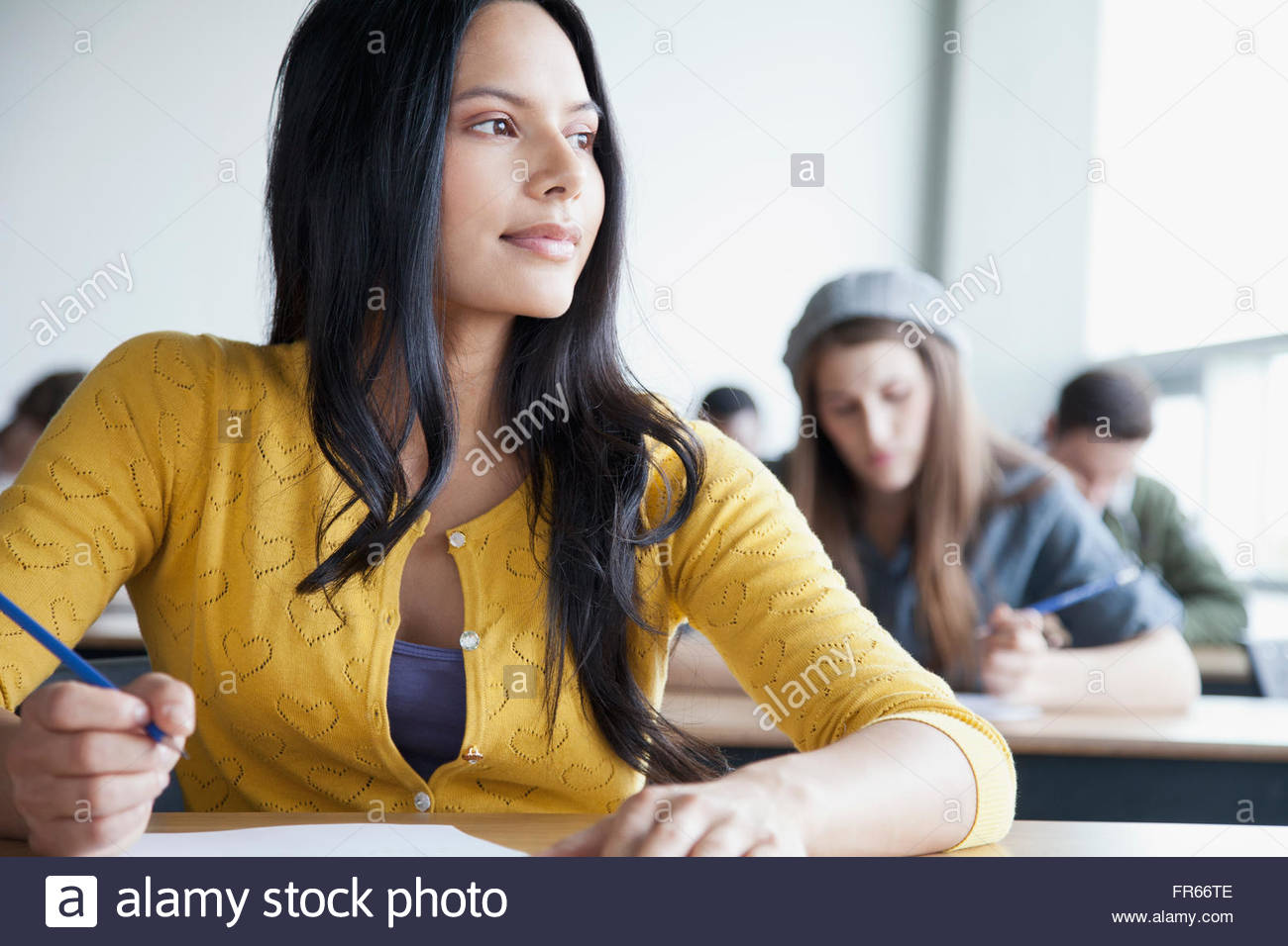 Adult student writing hi-res stock photography and images - Alamy