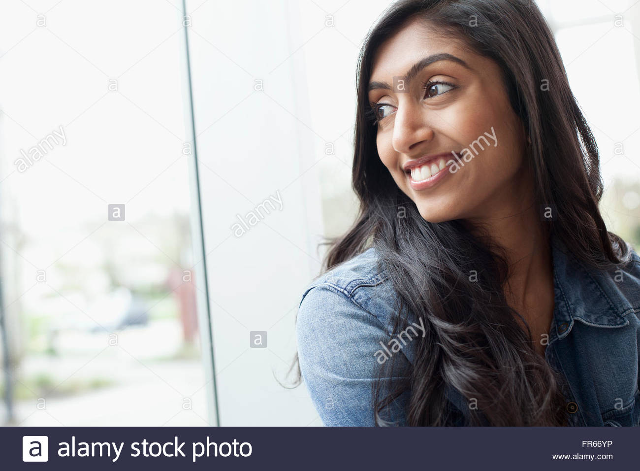 pretty college student looking out window Stock Photo - Alamy