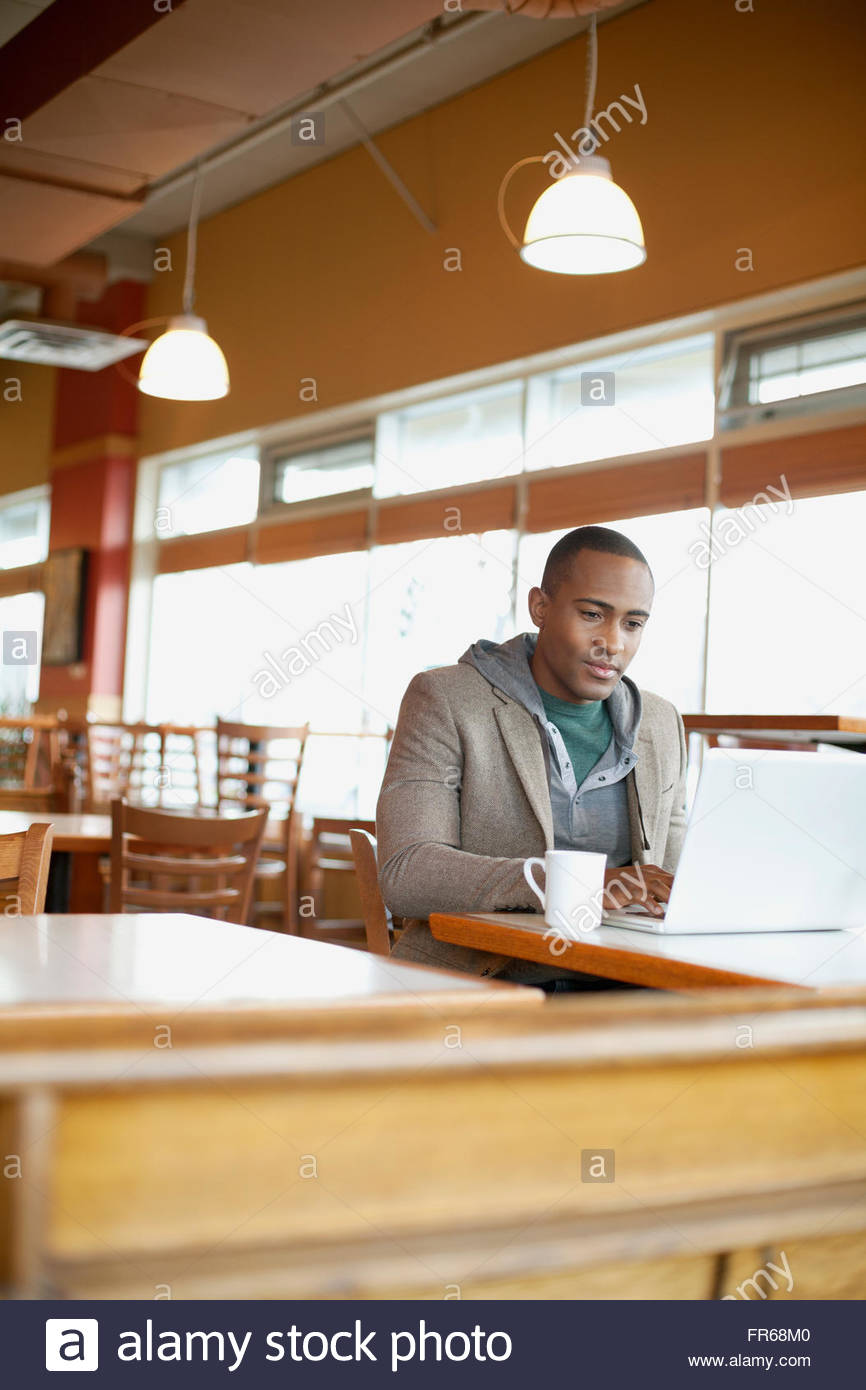 man using wi-fi technology at cafe Stock Photo - Alamy