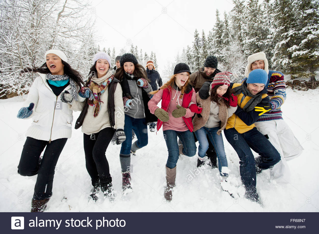 group of adults enjoying the wintery outdoors Stock Photo - Alamy