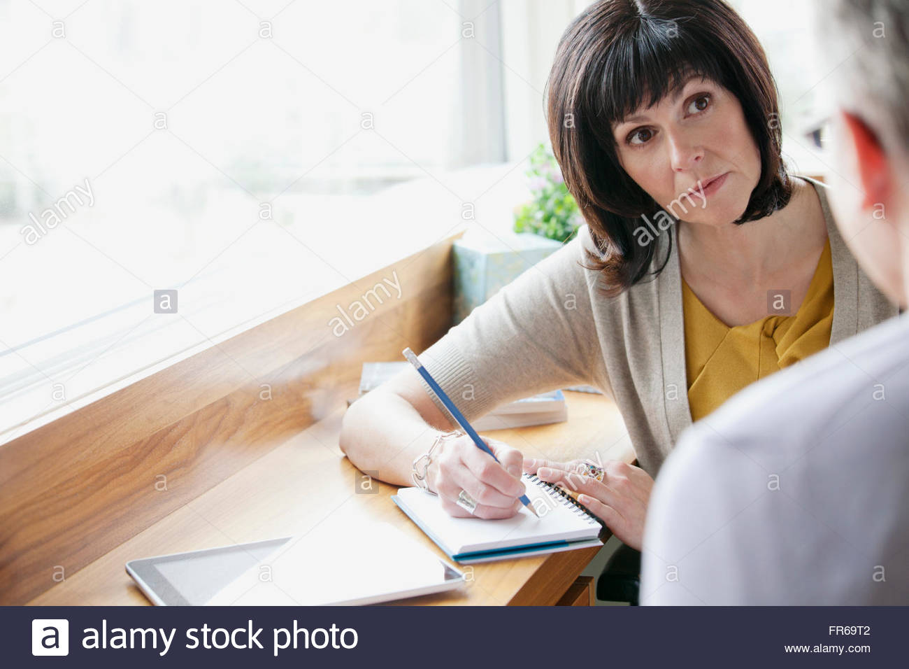 professional taking patient information Stock Photo - Alamy