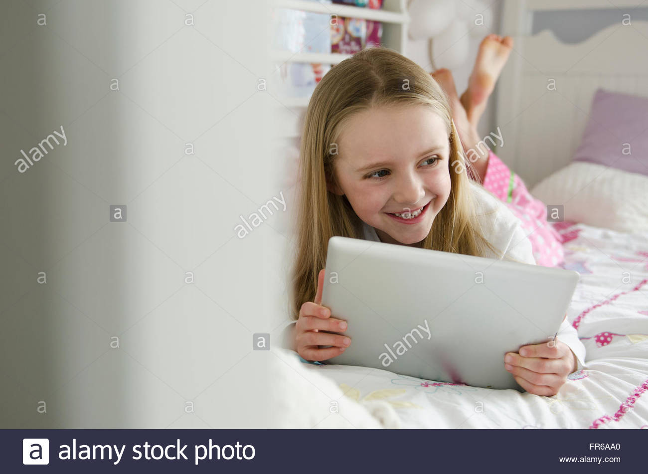 Playing on ipad hi-res stock photography and images - Alamy