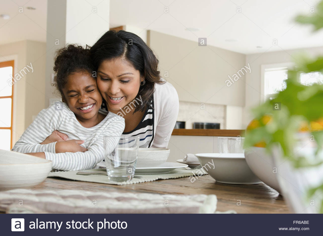 Child hug kitchen hi-res stock photography and images - Alamy