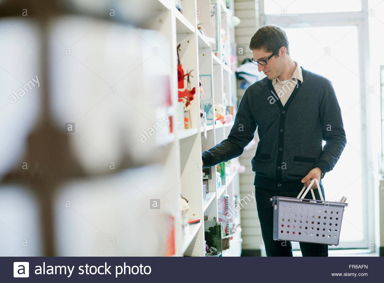 trendy man shopping in stationery store Stock Photo - Alamy