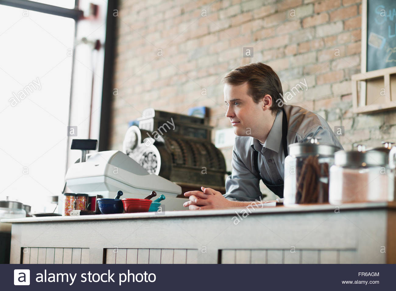 merchant of retail spice store Stock Photo - Alamy