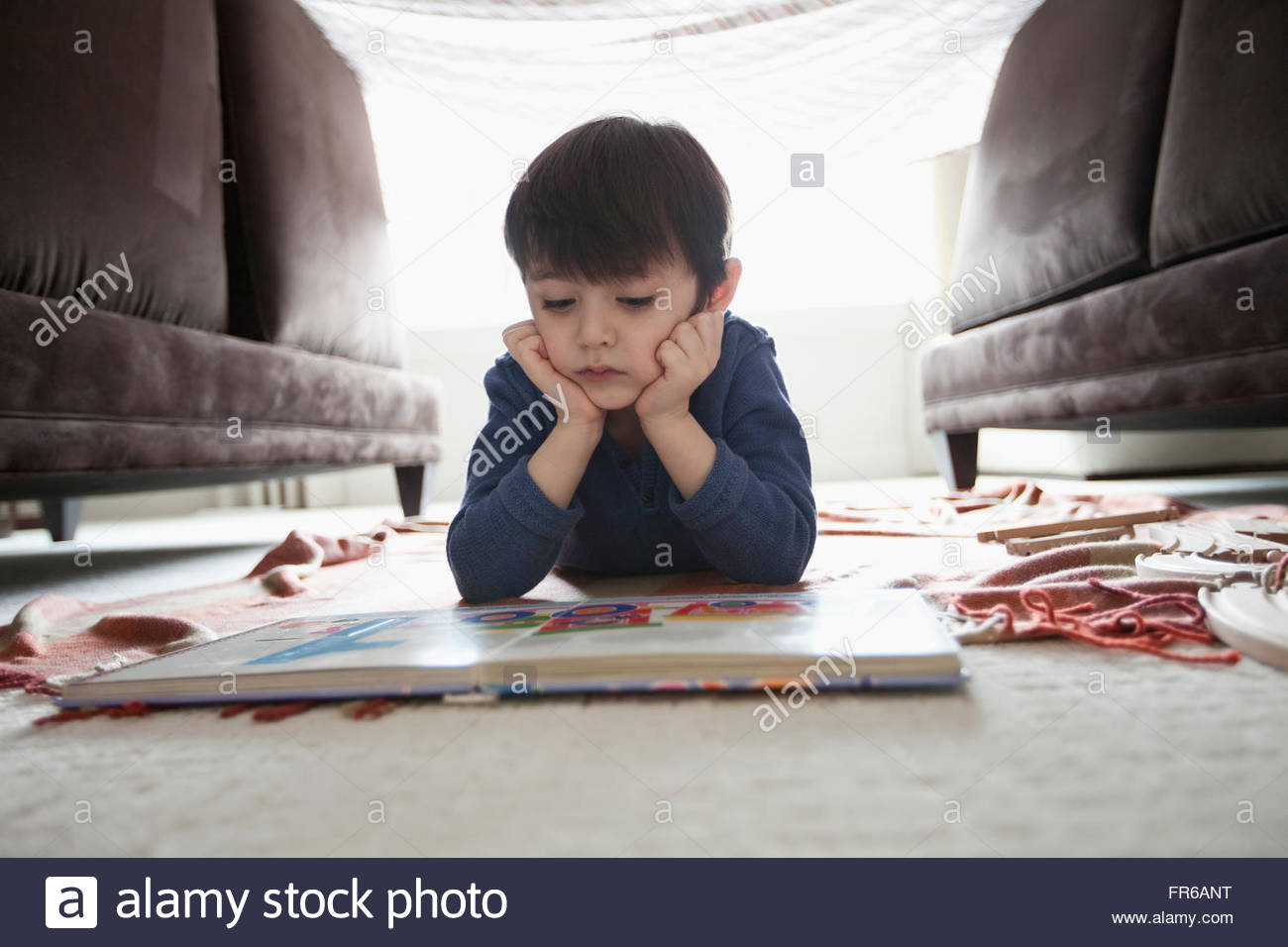 young boy reading Stock Photo - Alamy