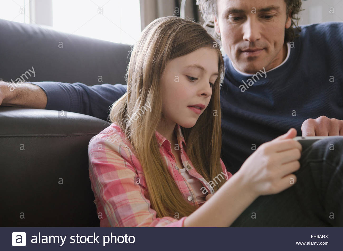 dad and daughter enjoying technology together Stock Photo - Alamy dad and daughter enjoying technology together Stock Photo - Alamy