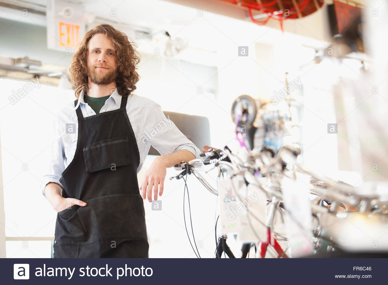 proud bike shop owner Stock Photo - Alamy