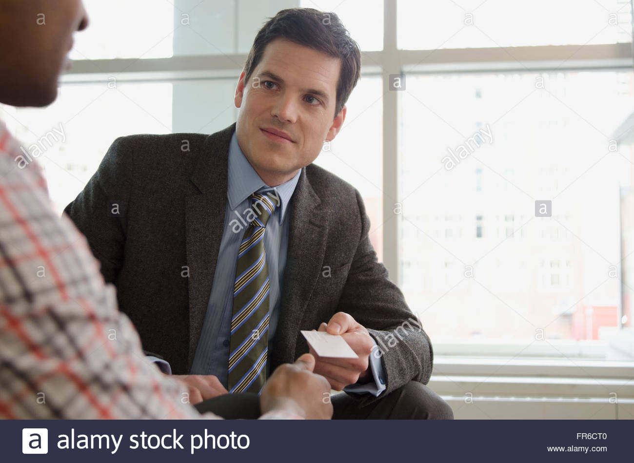 two people discussing business Stock Photo - Alamy